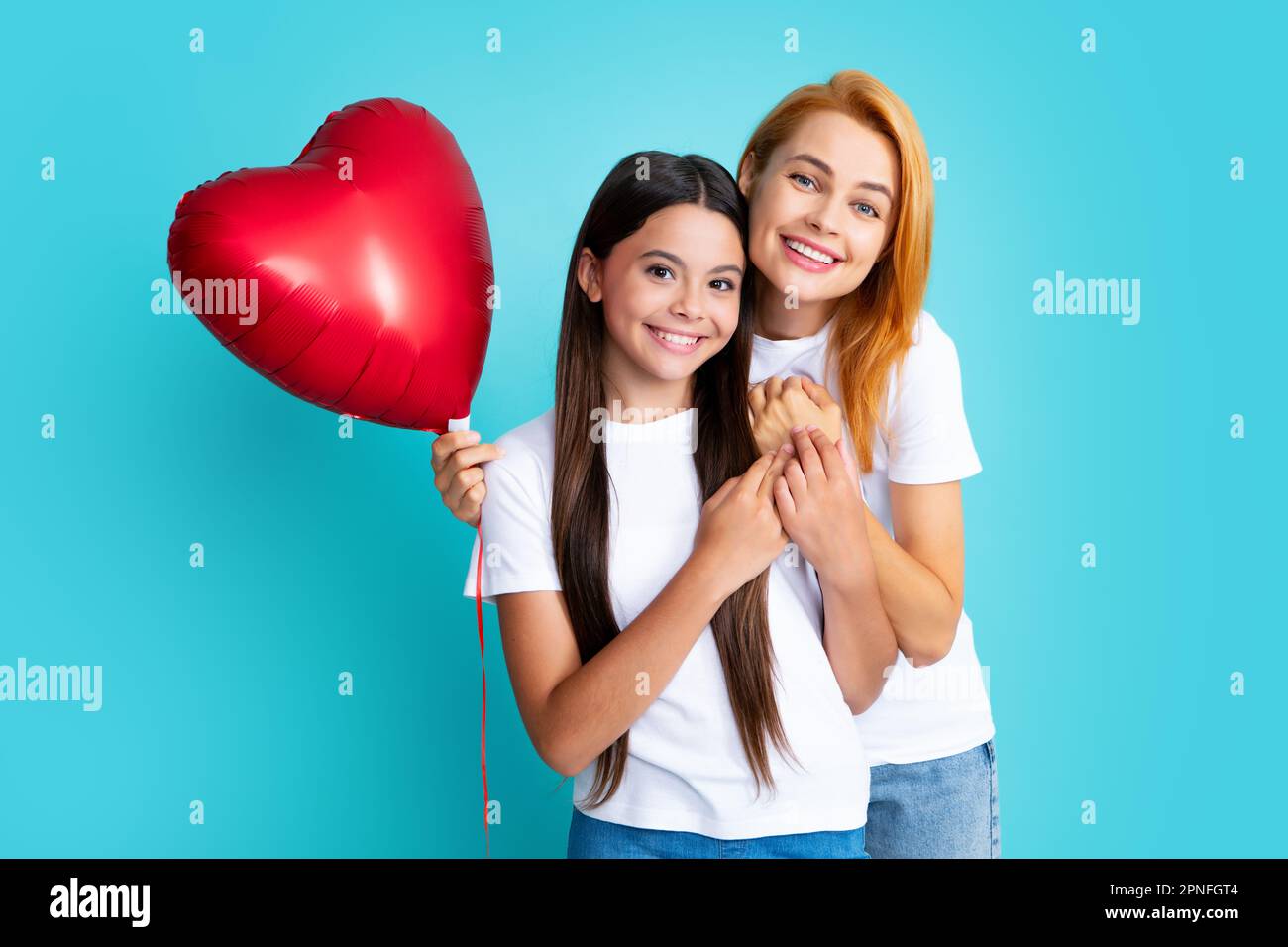 Mothers day celebration. Best mom. Child daughter cuddling embrace to ...