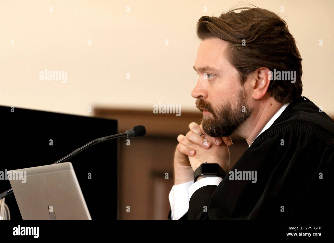 Judge John Torbitzky listens as lawyers make arguments to him about a ...