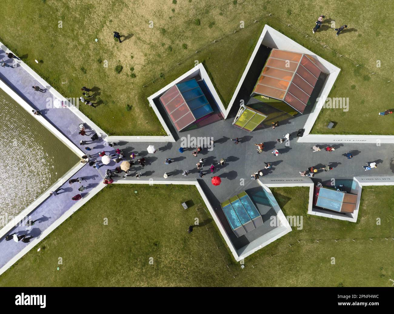 Aerial photo shows tourists visiting the Holland Flower Park in Dafeng ...