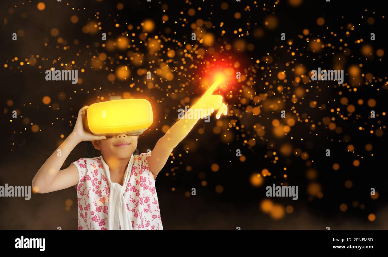 Metaverse technology concept. A girl with VR virtual reality goggles or ...