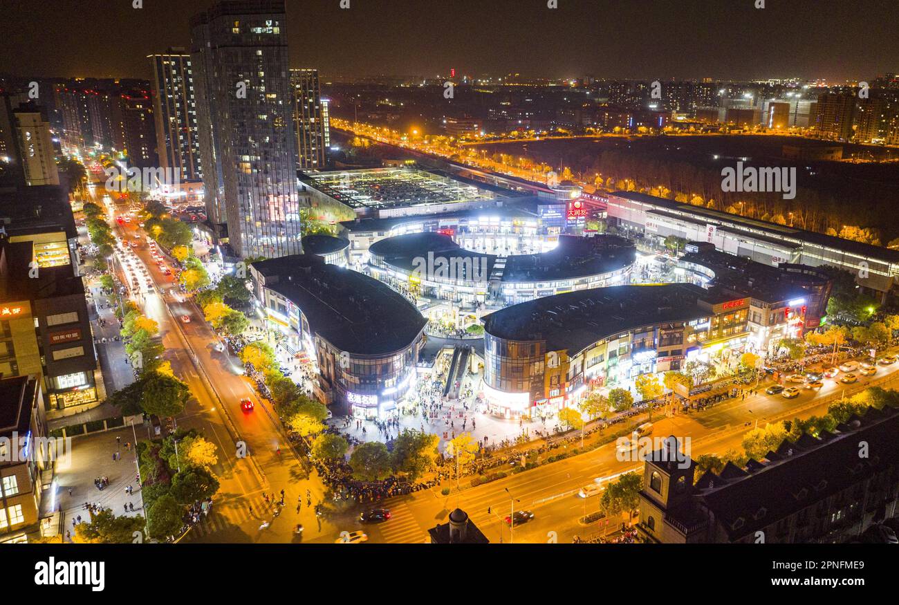 Aerial photo shows people shopping in the largest night market in ...