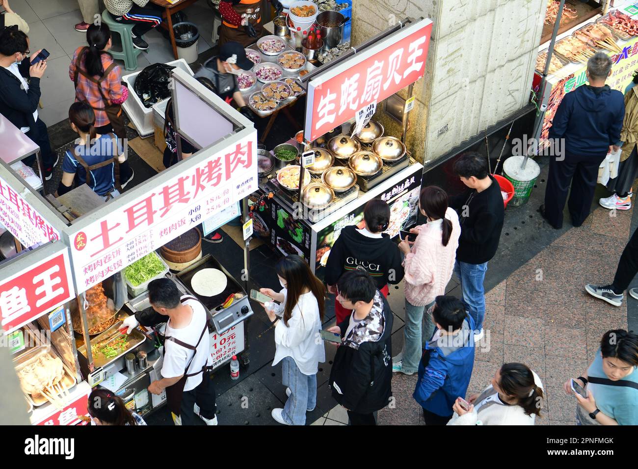Aerial photo shows people shopping in the largest night market in ...