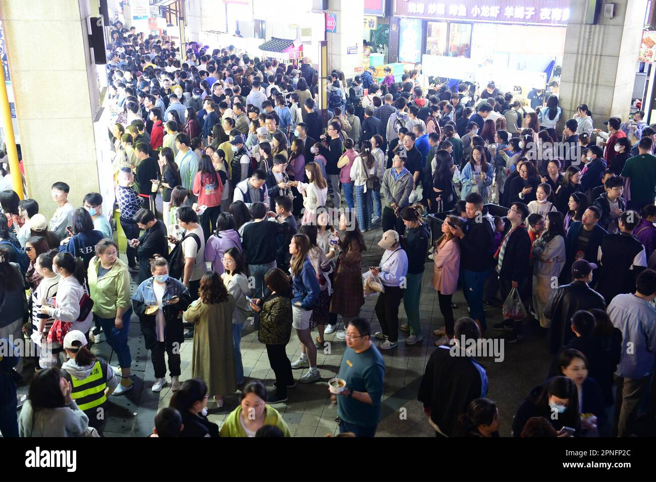 Aerial photo shows people shopping in the largest night market in ...