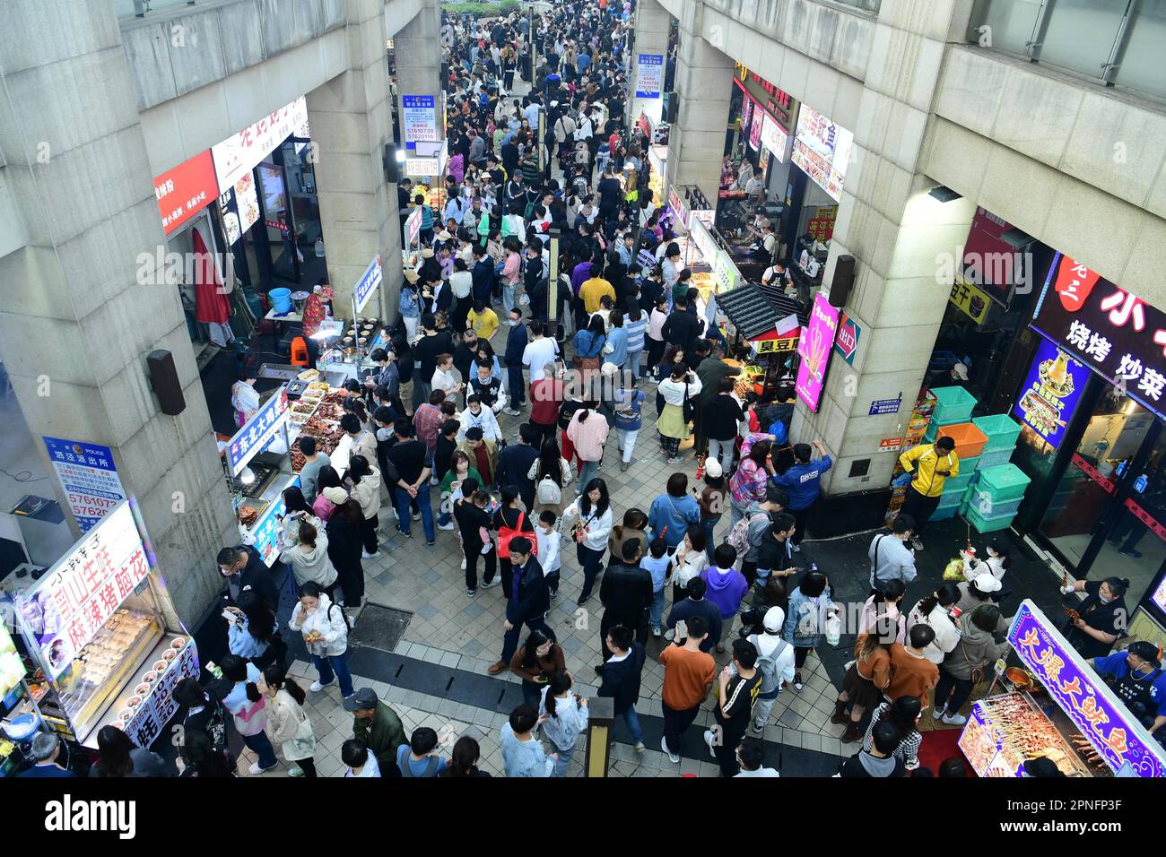 Aerial photo shows people shopping in the largest night market in ...