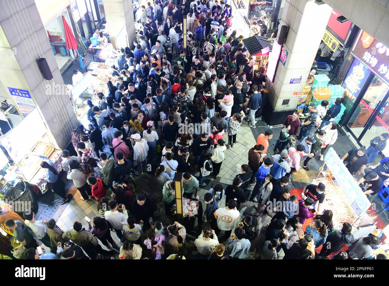 Aerial photo shows people shopping in the largest night market in ...