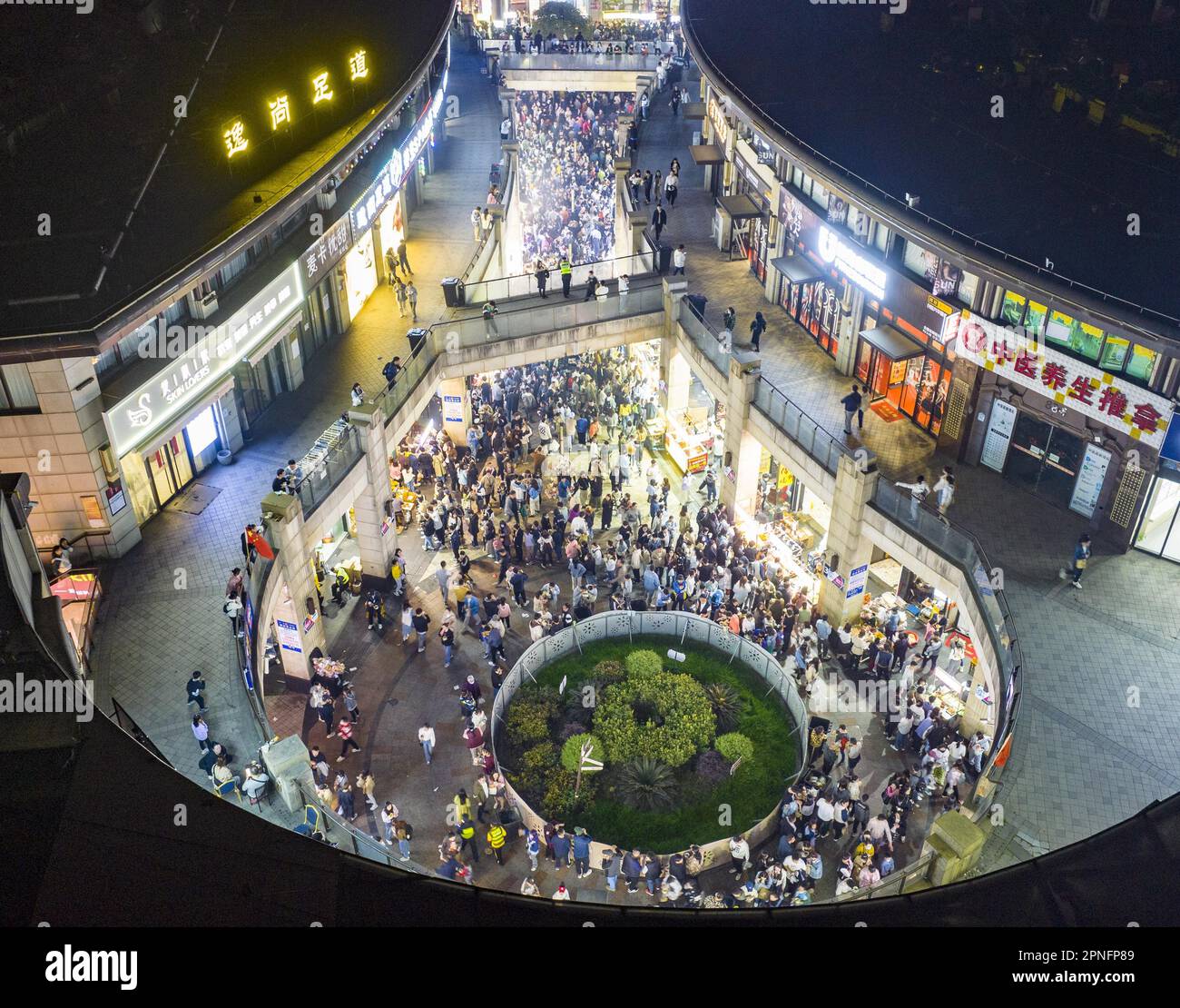Aerial photo shows people shopping in the largest night market in ...