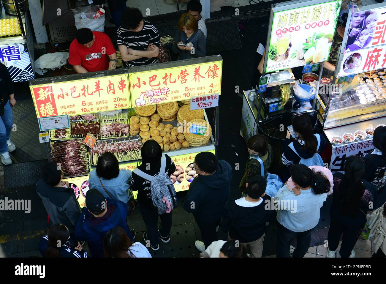 Aerial photo shows people shopping in the largest night market in ...