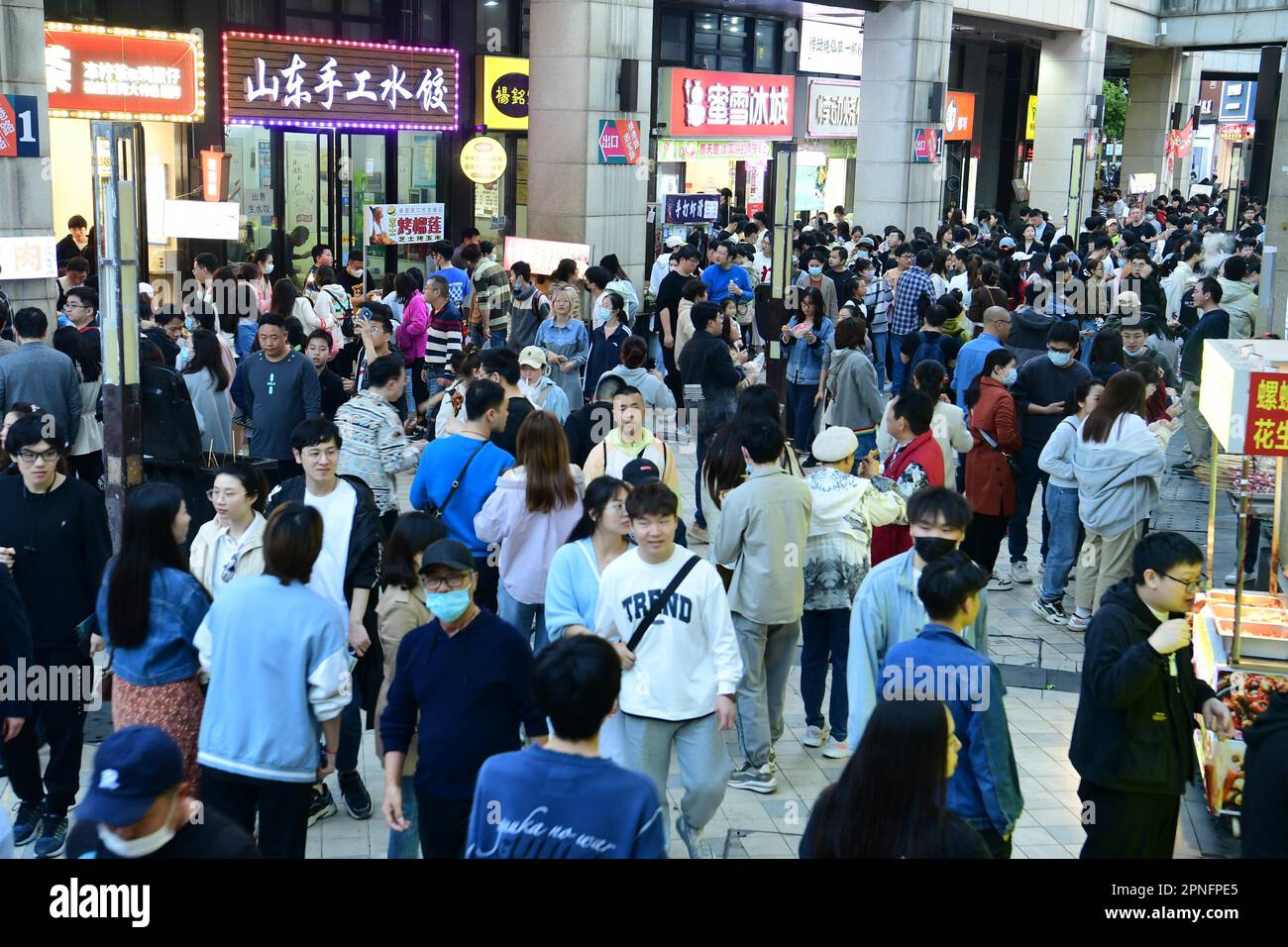 Aerial photo shows people shopping in the largest night market in ...