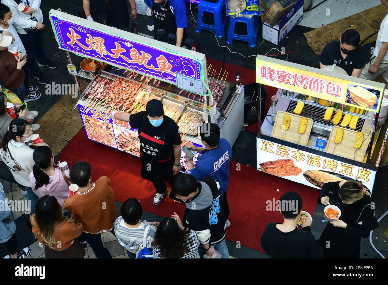 Aerial photo shows people shopping in the largest night market in ...