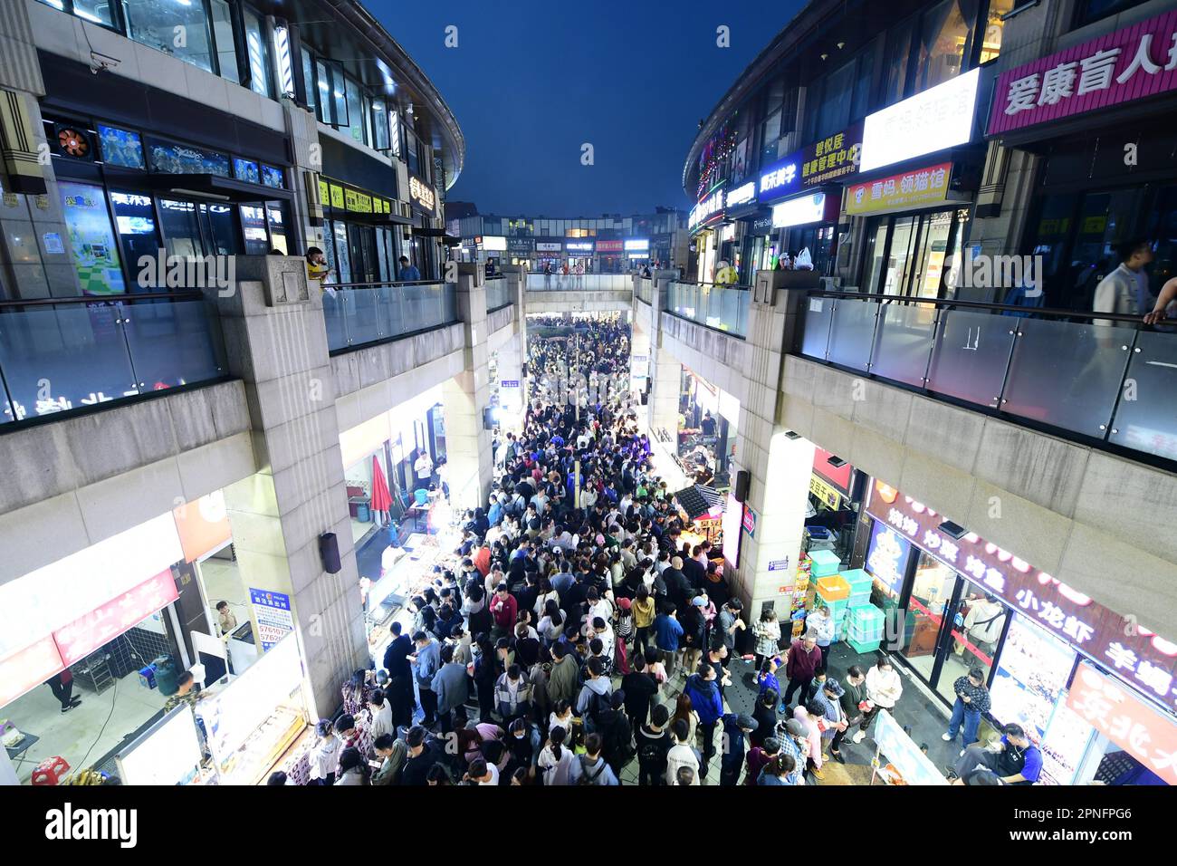 Aerial photo shows people shopping in the largest night market in ...