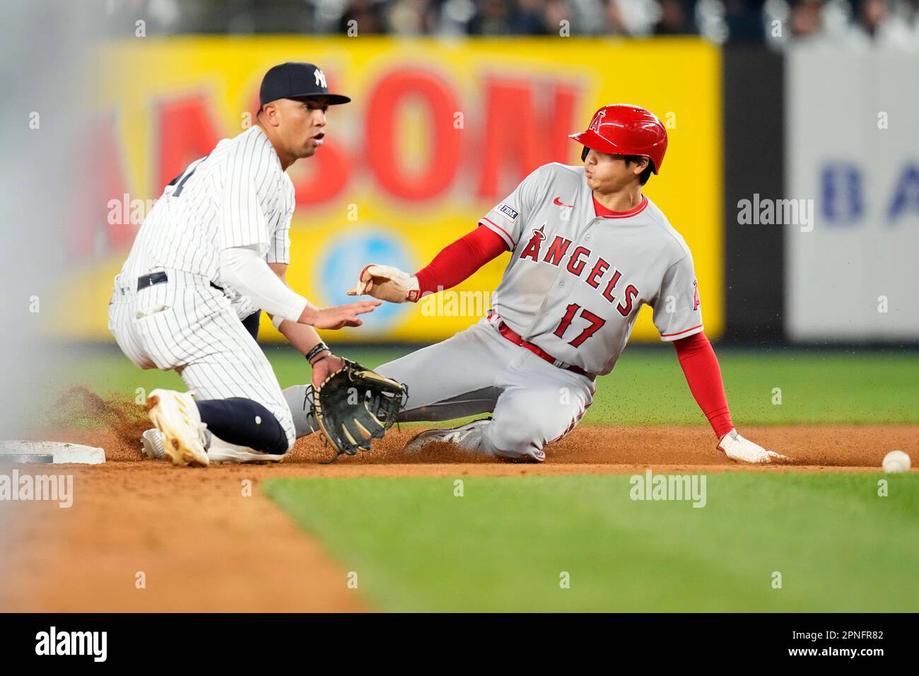 Los Angeles Angels' Shohei Ohtani, of Japan, slides past New York ...