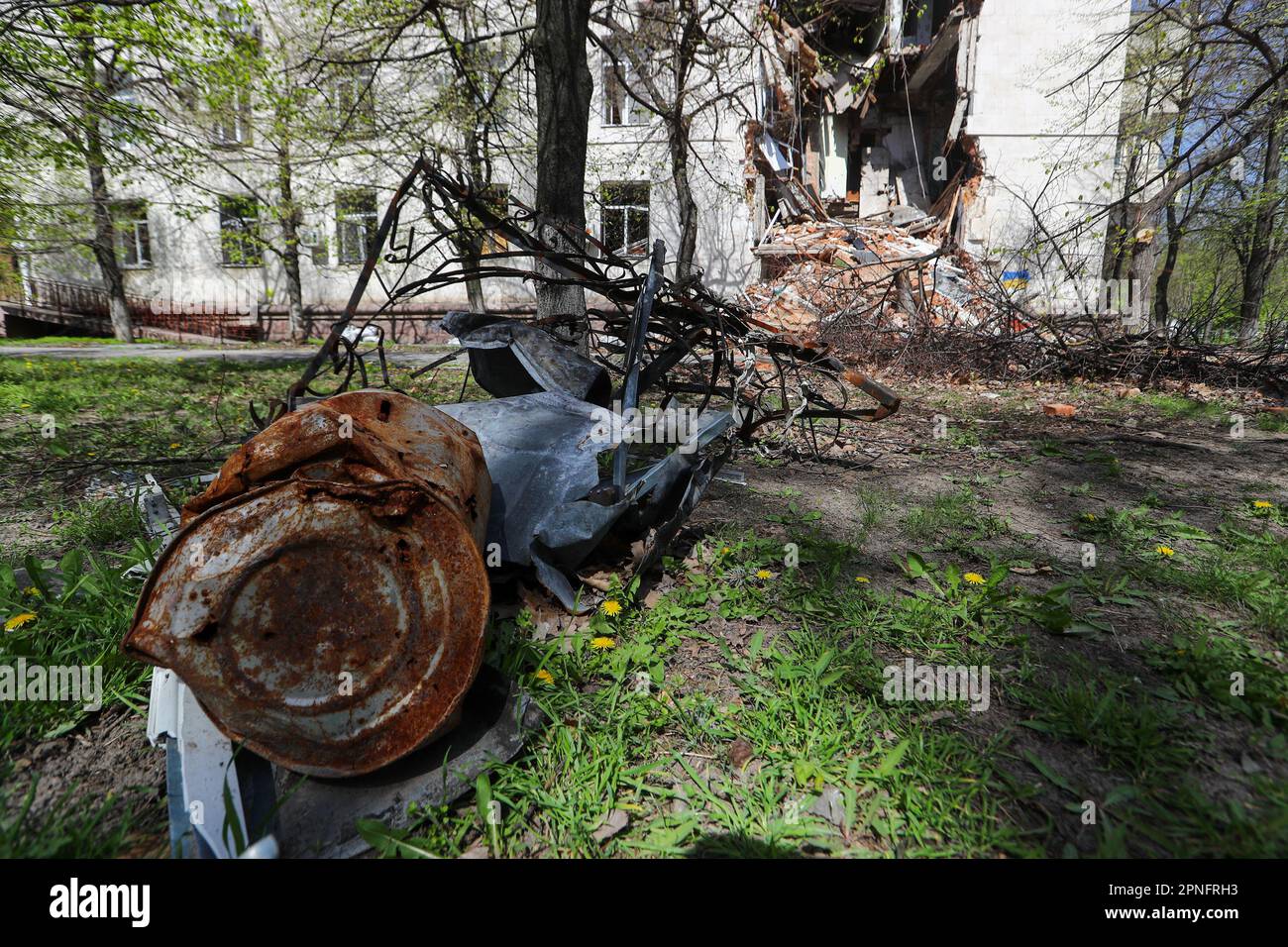 Kherson, Ukraine. 18th Apr, 2023. A piece of shrapnel lies in front of ...