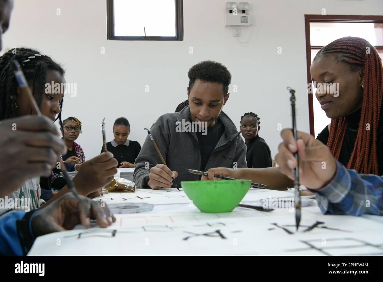Nairobi, Kenya. 18th Apr, 2023. Kenyan students write Chinese ...