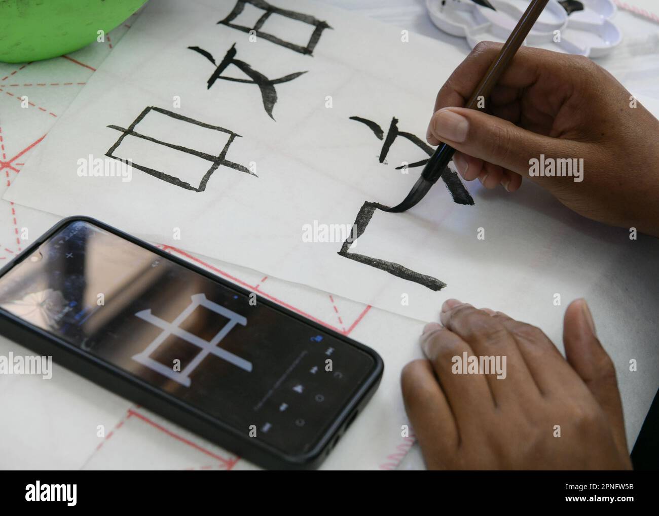 Nairobi, Kenya. 18th Apr, 2023. A Kenyan student writes Chinese ...