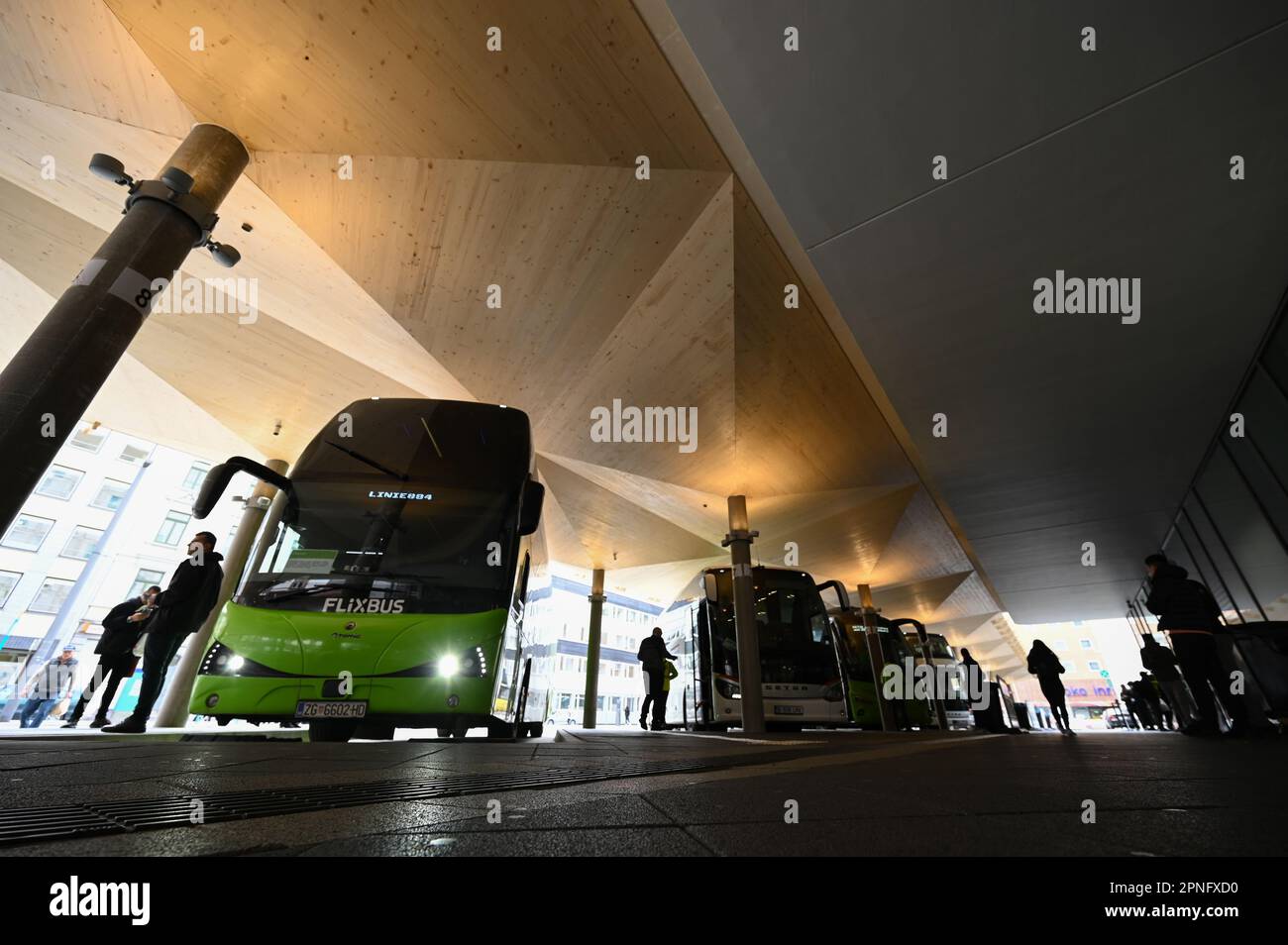 PRODUCTION - 18 April 2023, Hesse, Frankfurt/Main: Long-distance buses ...