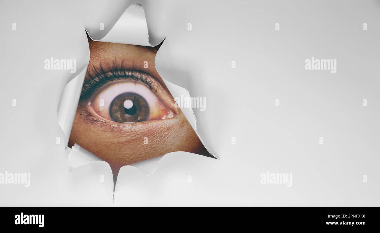Eye Peeking Through Peep Hole Watching Something Scary Scared Woman With Look Of Horror In Her