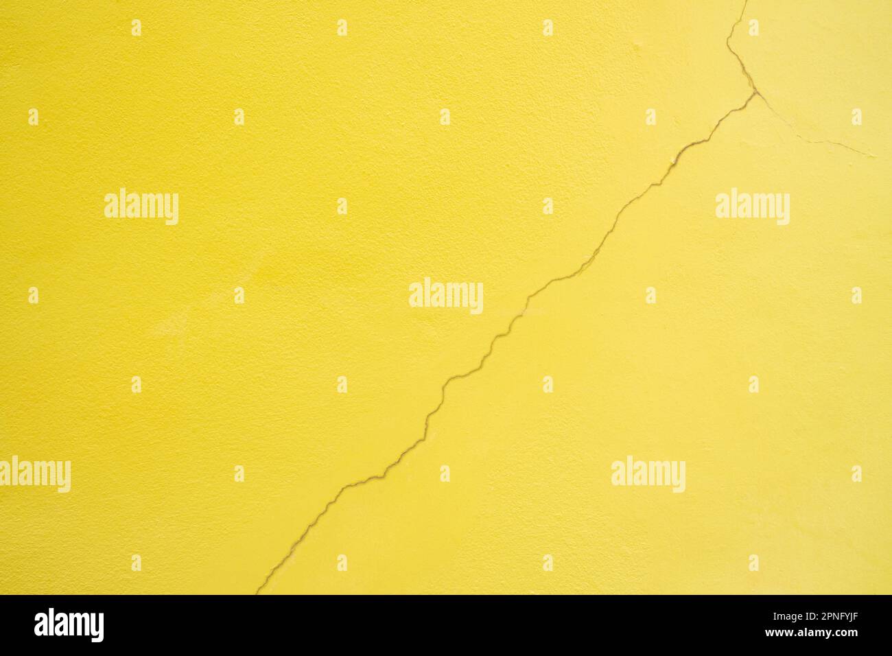 Cracks on surface of yellow cement statue background Stock Photo - Alamy