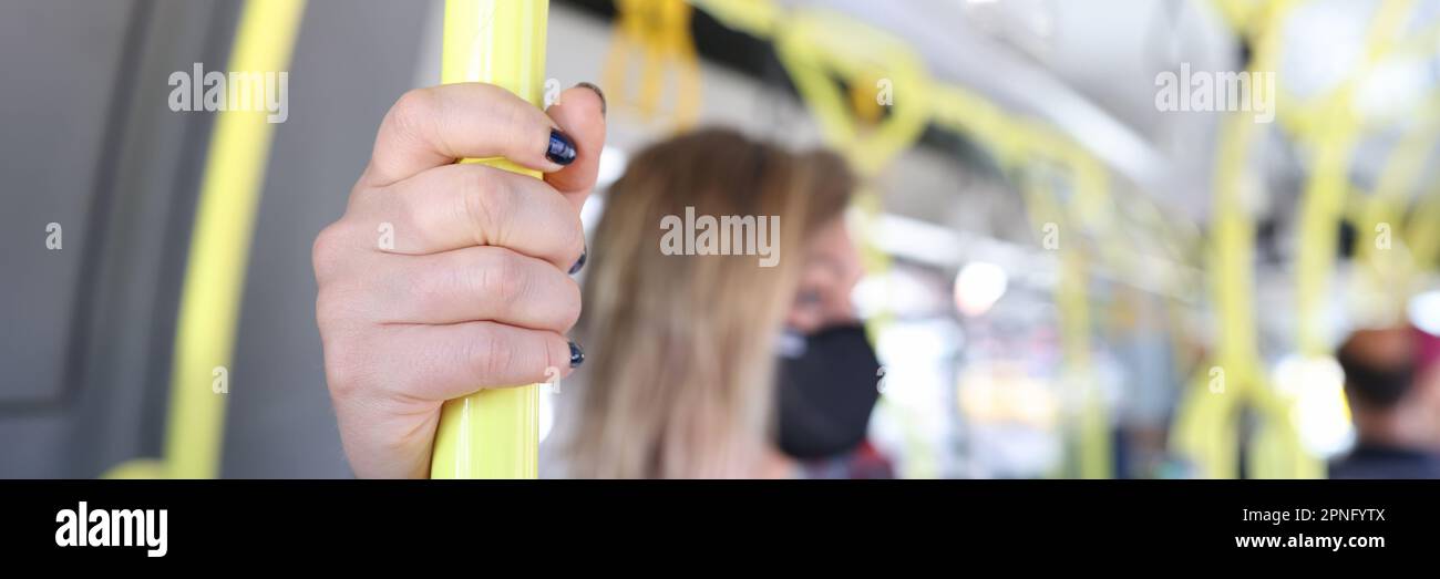 Woman holding subway handrail commuting hi-res stock photography and ...