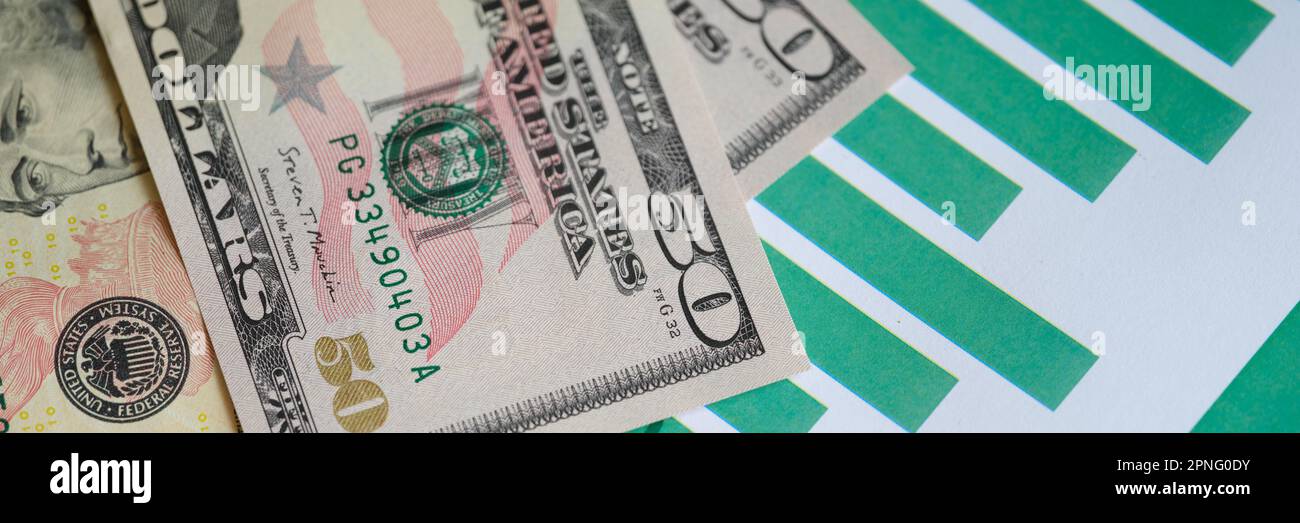 Financial documents with charts, graphs and cash Stock Photo - Alamy