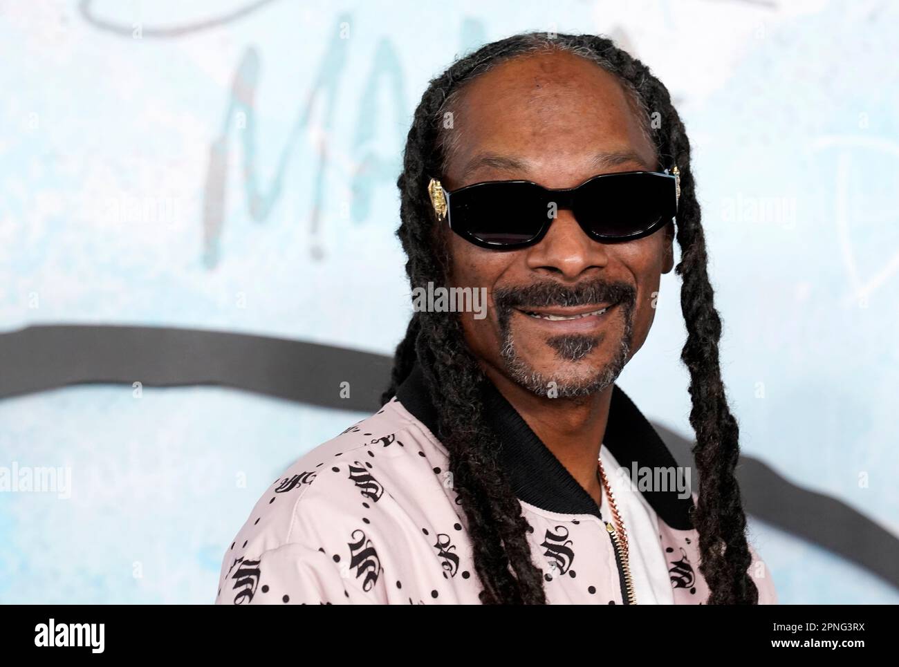 Snoop Dogg poses at the premiere of the FX docuseries "Dear Mama ...
