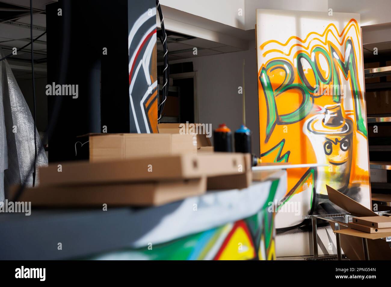 Rusty structure of abandoned warehouse with graffiti art on walls ...