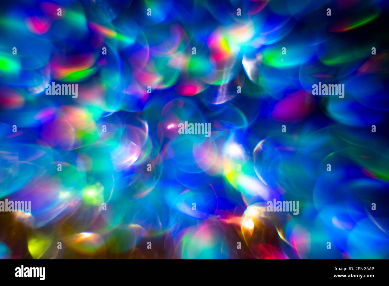 Colorful glitter lights background. Defocused bokeh. Lights texture ...