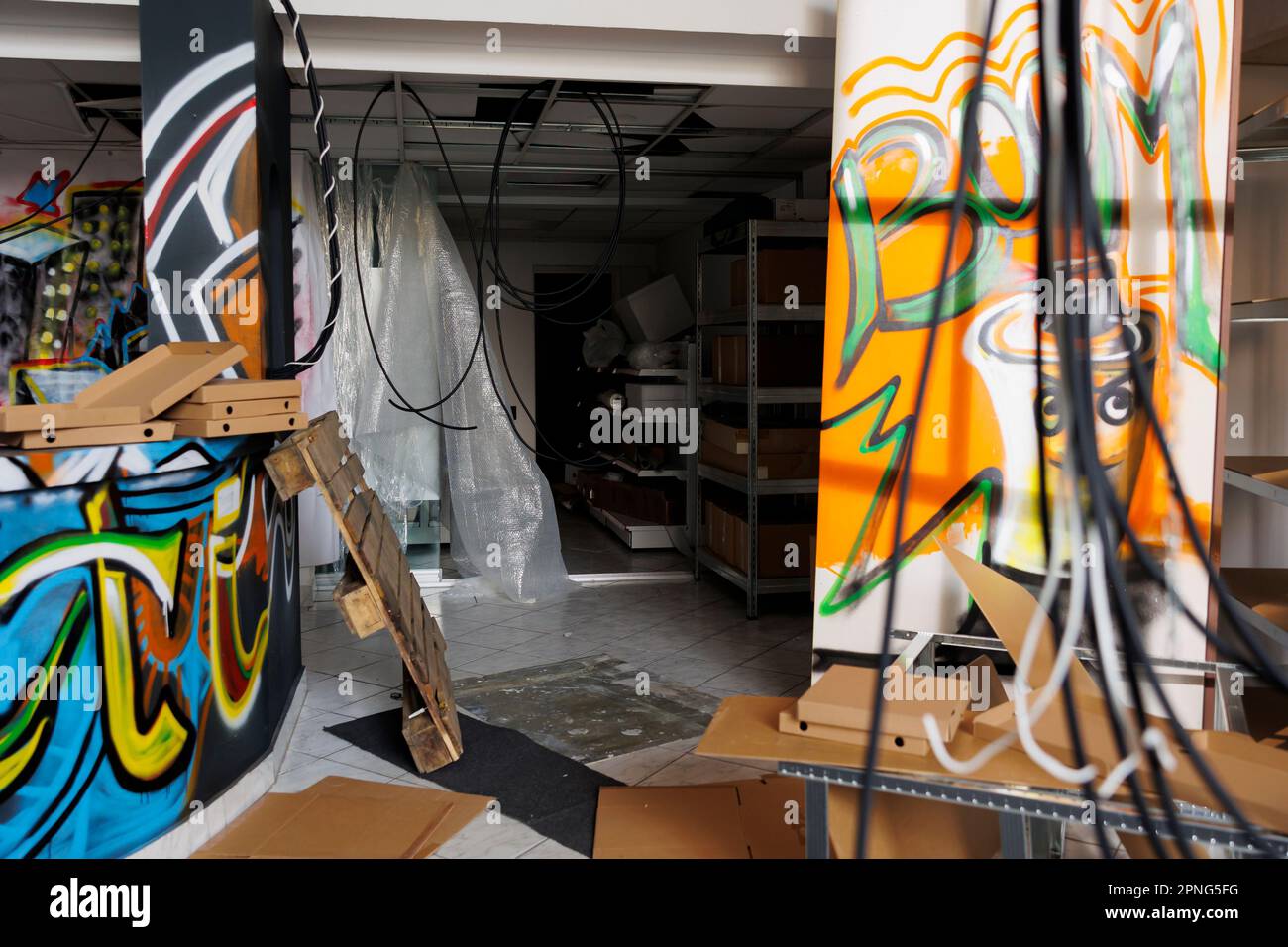 Ruined structure of abandoned warehouse in ruins, artistic graffiti on ...