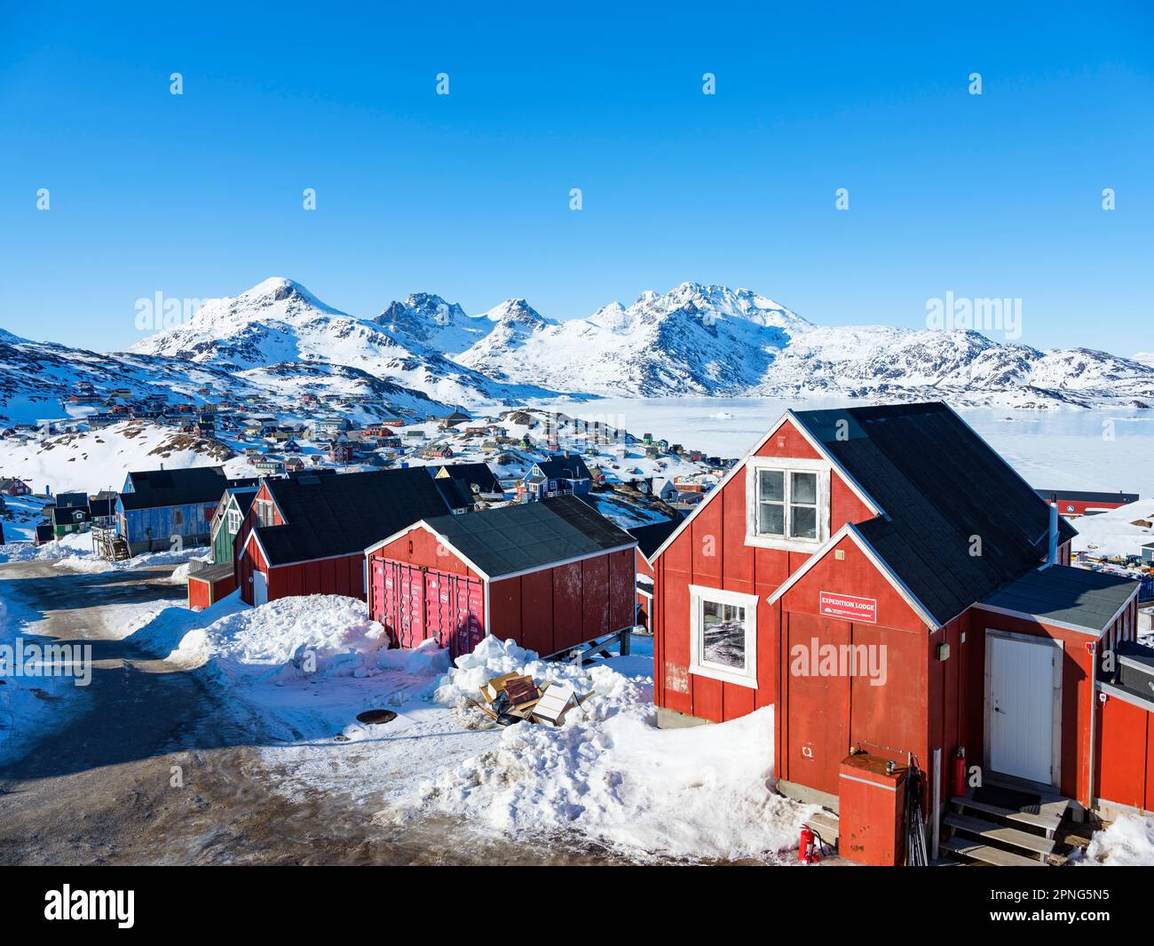 Colourful wooden houses in Tasiilaq in winter, Ammassalik Island ...
