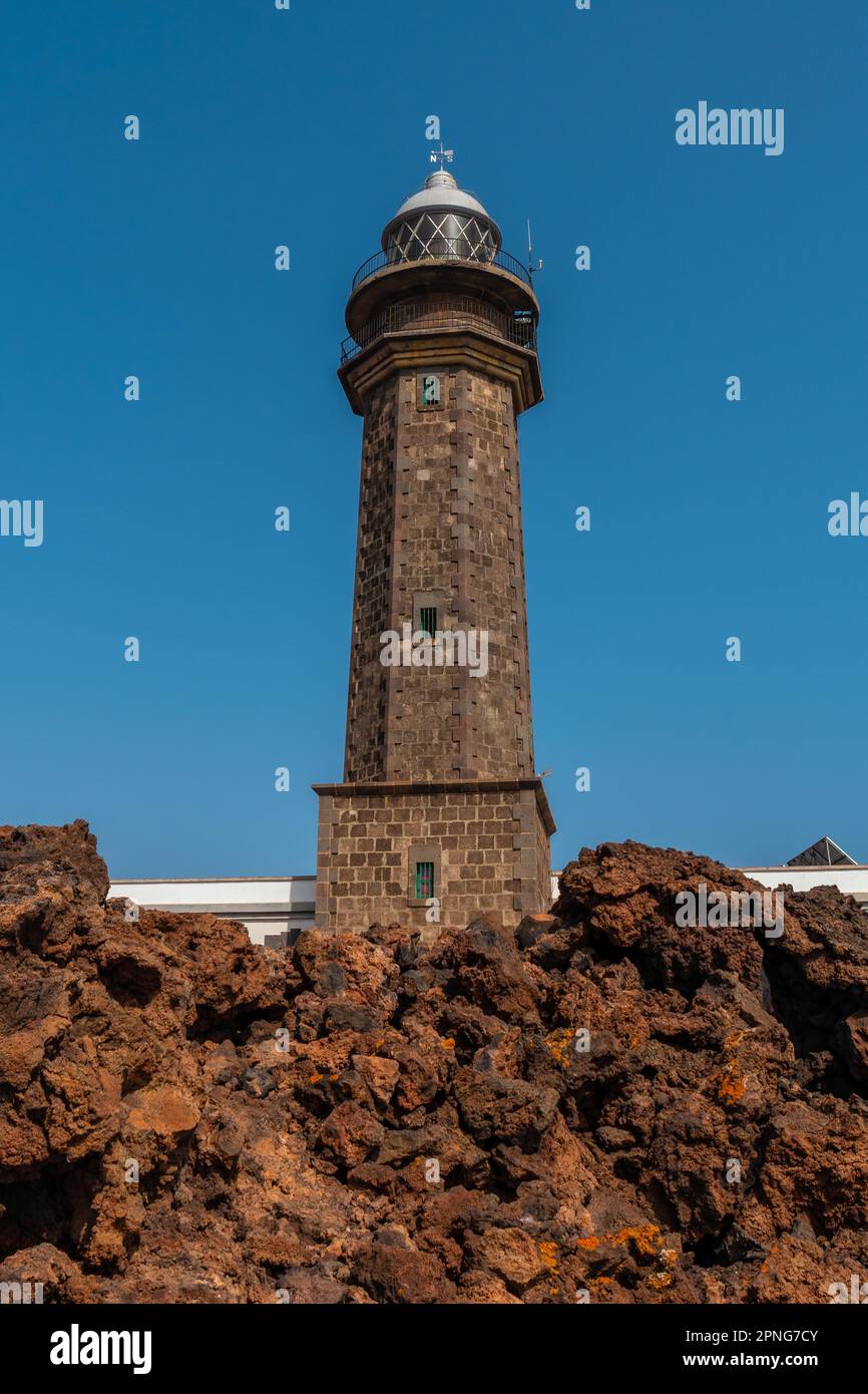 Beautiful Orchilla lighthouse with volcanic stones on the southwest ...