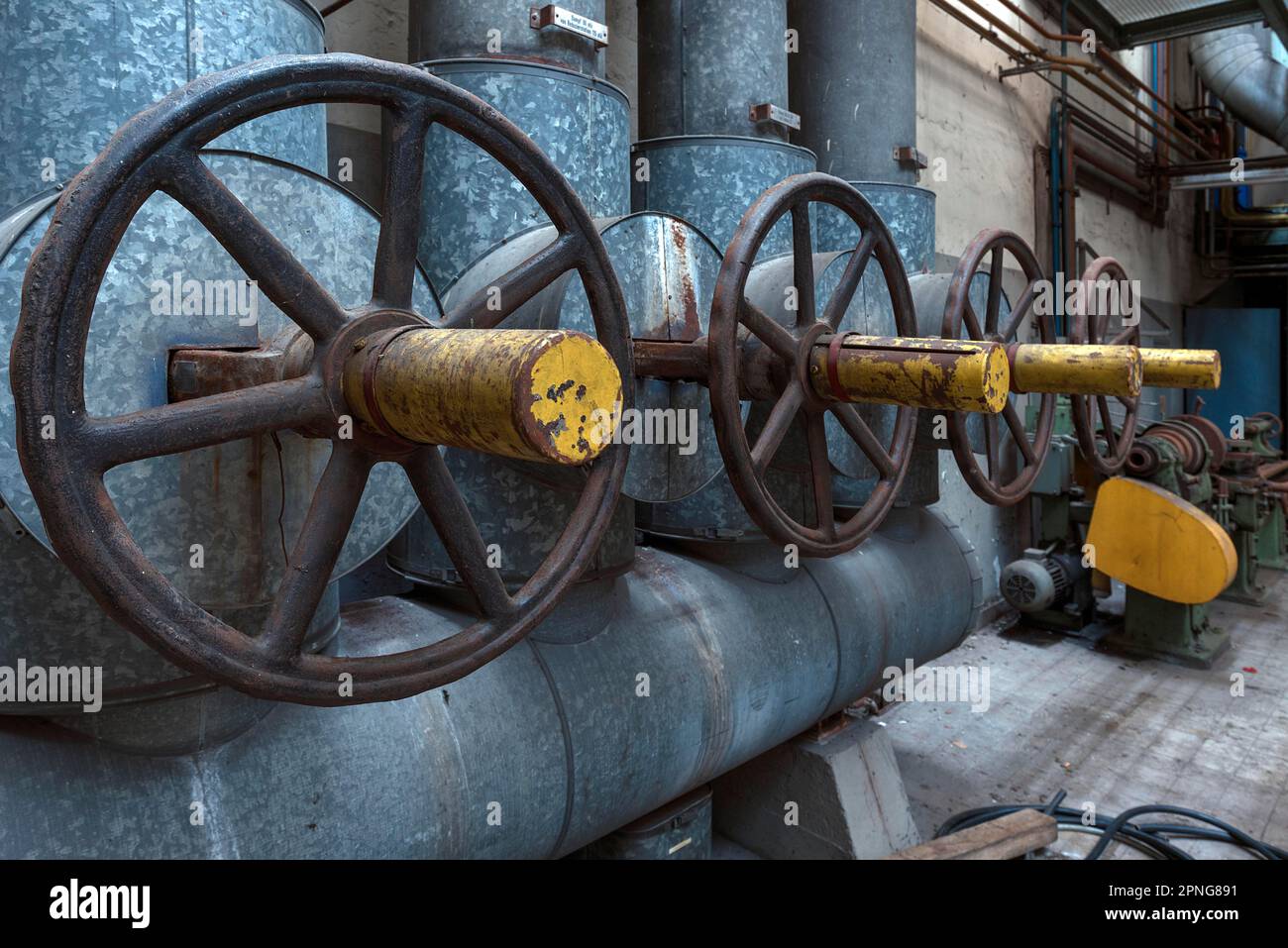 Large steam regulators of a former paper factory, Lost Place, Baden ...