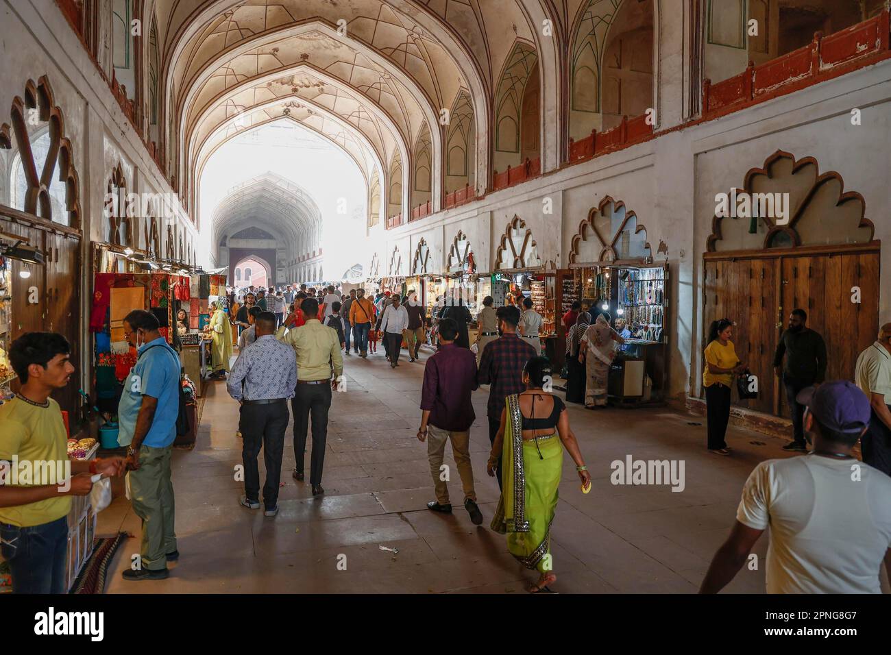 People shop at the Chhatta Chowk Bazaar in the Red Fort, Delhi, India ...