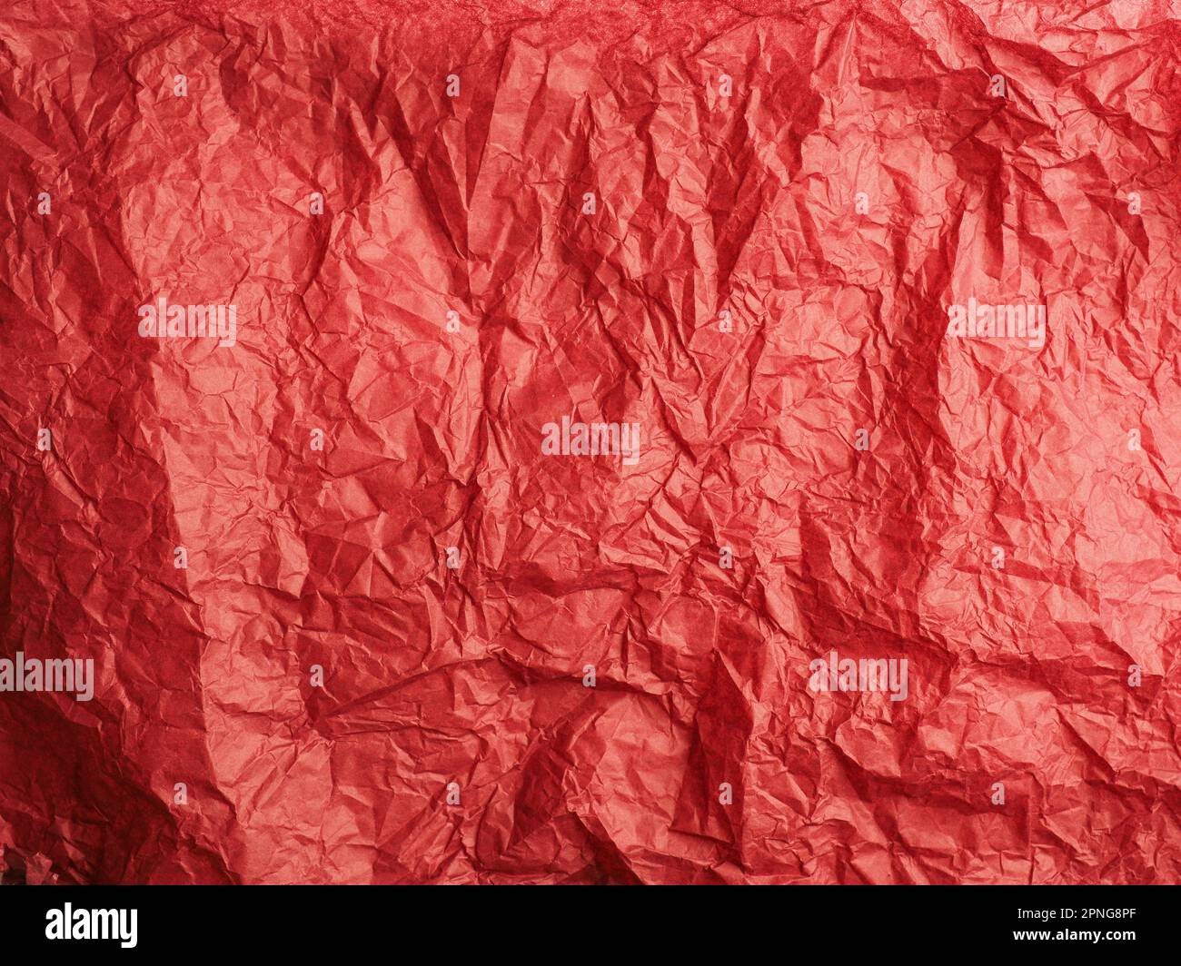 Wrinkled red recycling paper using as background, environmental ...