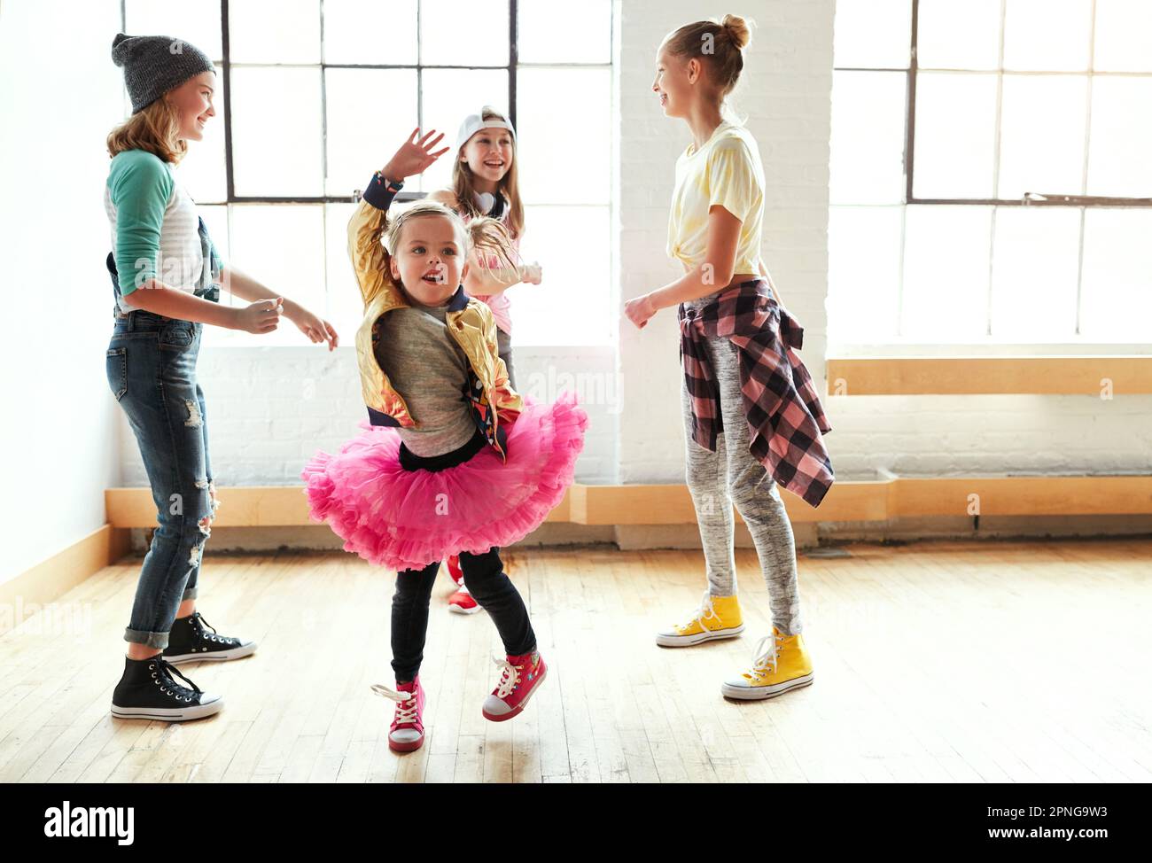Dance to the beat of your dreams. young girls dancing in a dance studio ...