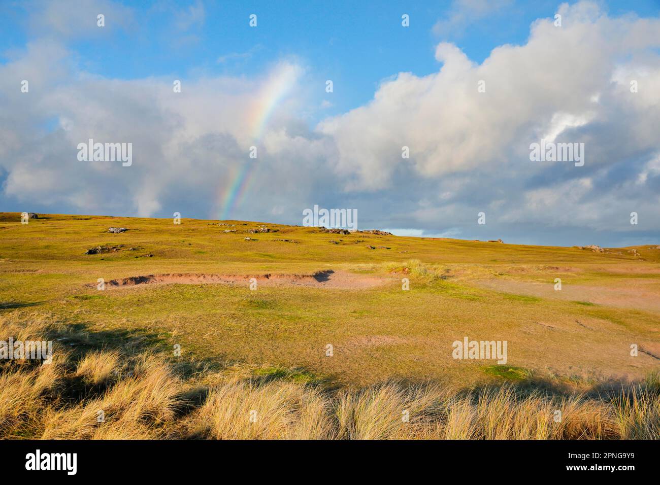 Rainbow over the sand dunes of Achnahaird Beach, Scottish Highlands ...