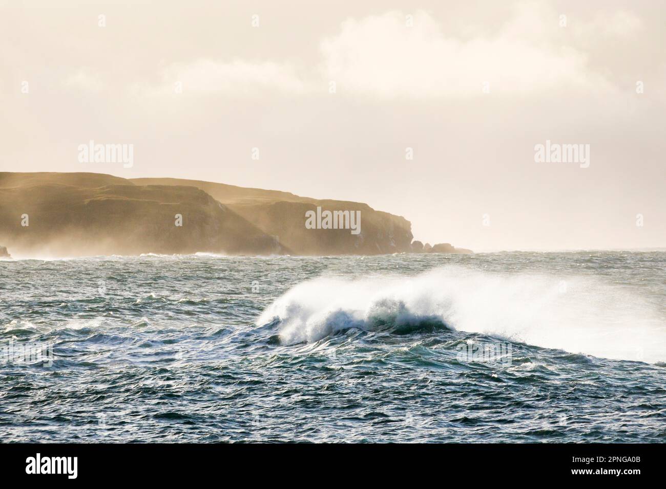 Atmospheric coastal landscape with Summer Isles at sunrise with stormy ...