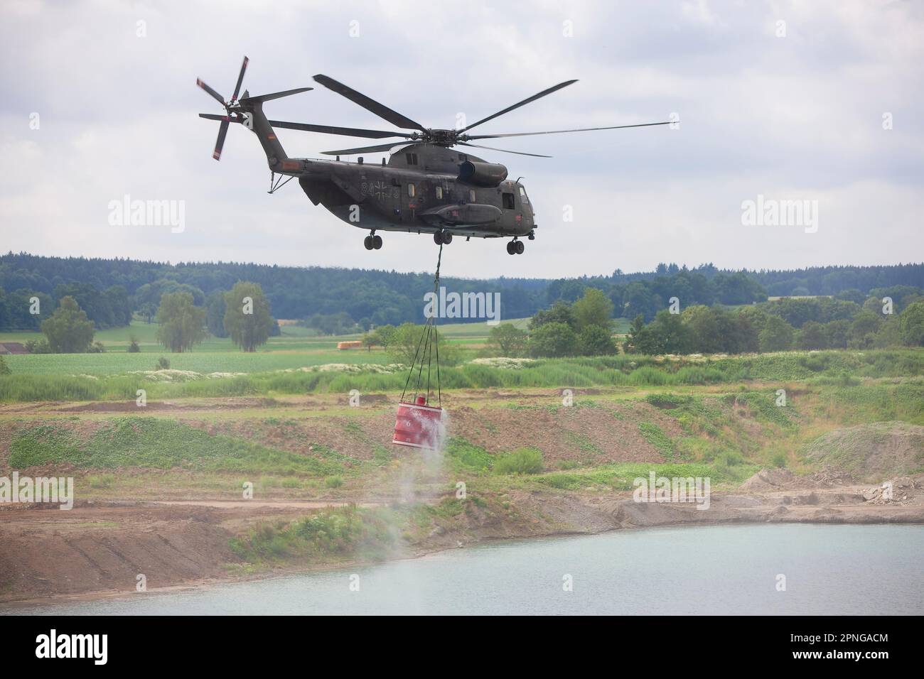 Bundeswehr helicopter with fire extinguishing tank 5000 litres, during ...