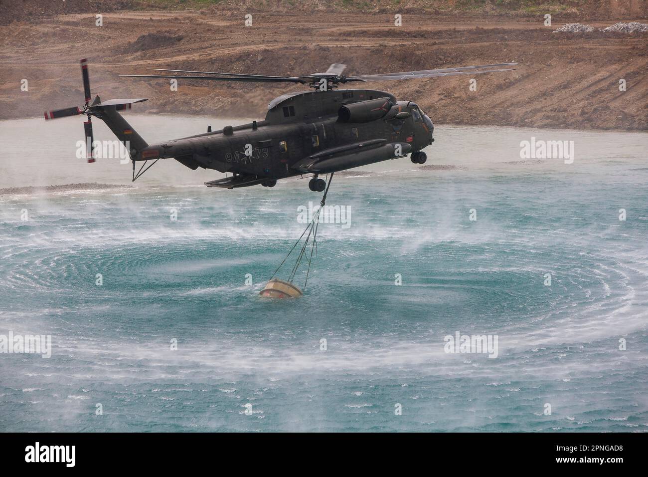 Bundeswehr helicopter with fire extinguishing tank 5000 litres, during ...