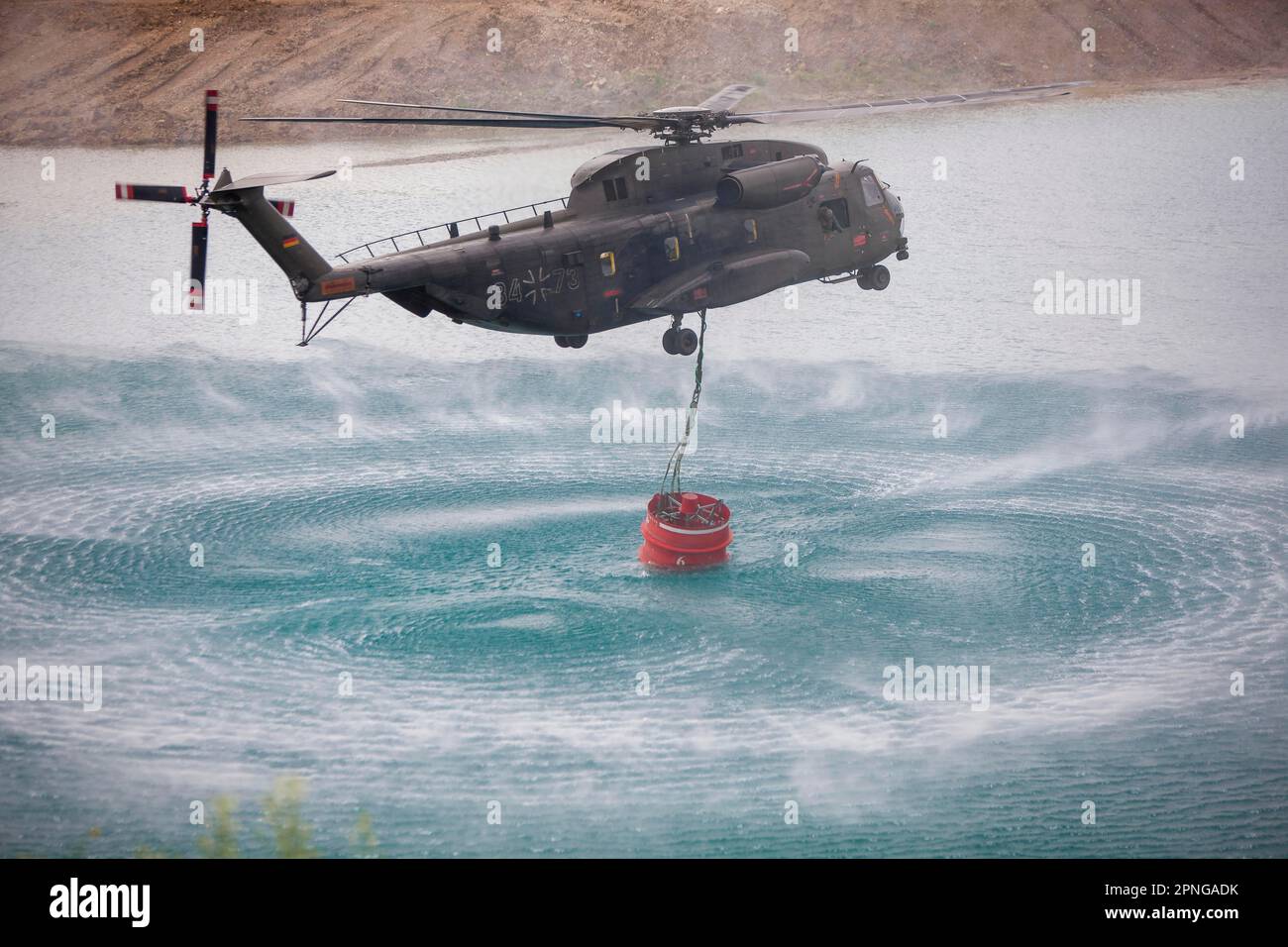 Bundeswehr helicopter with fire extinguishing tank 5000 litres, during ...