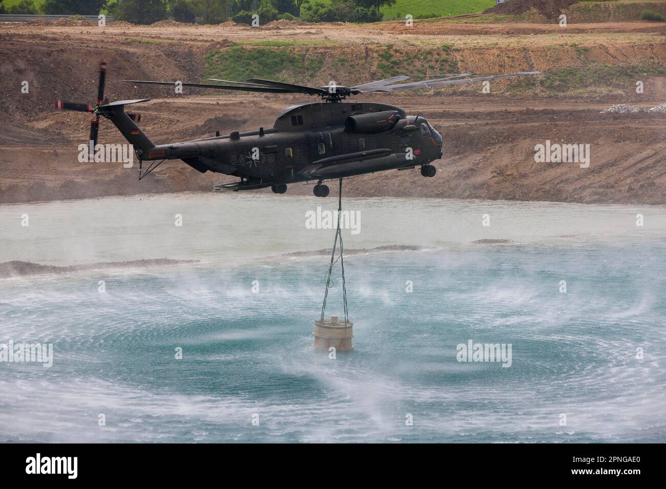 Bundeswehr helicopter with fire extinguishing tank 5000 litres, during ...