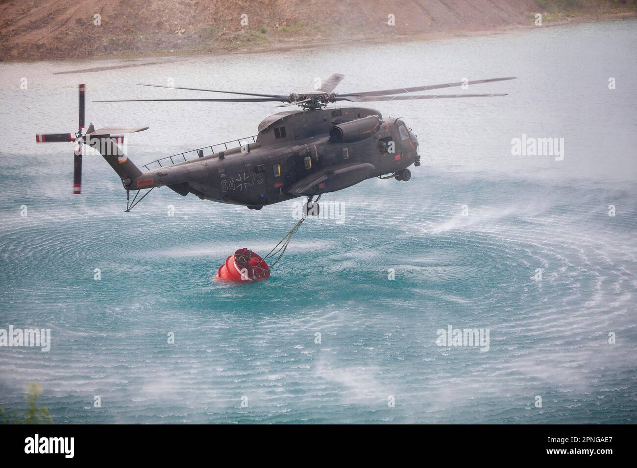 Bundeswehr helicopter with fire extinguishing tank 5000 litres, during ...