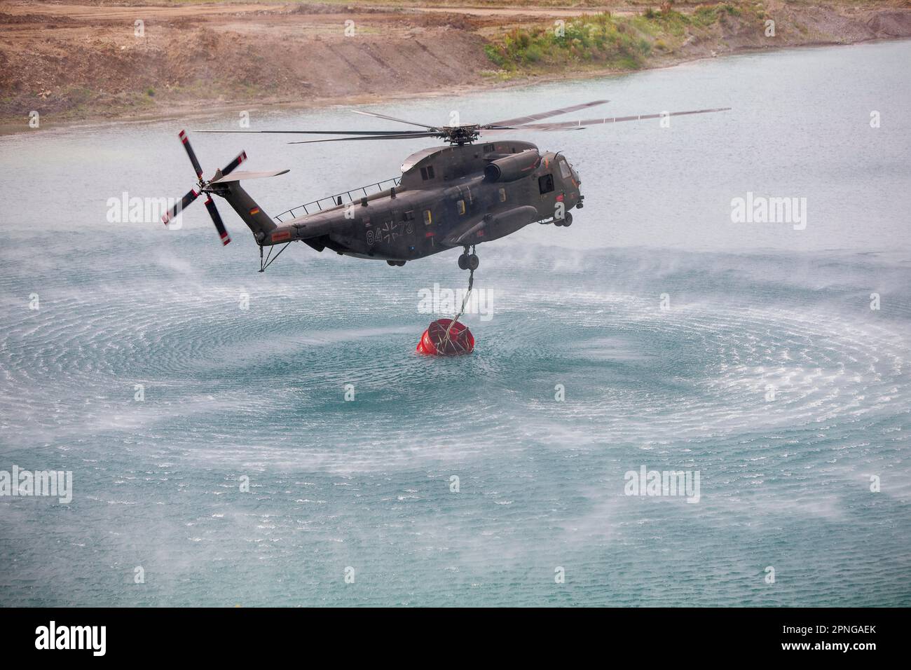 Bundeswehr helicopter with fire extinguishing tank 5000 litres, during ...