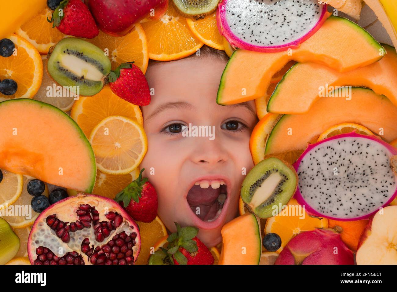 Healthy food background. Studio photo of different fruits with kids ...
