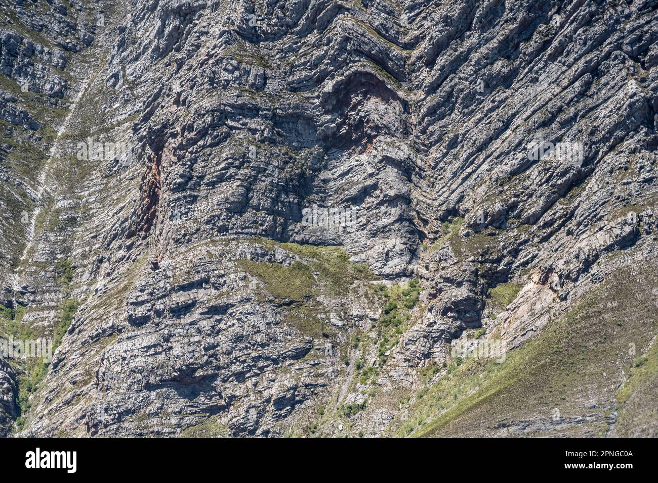 aerial landscape, from a glider, with waves of rock layers on cliffs at ...
