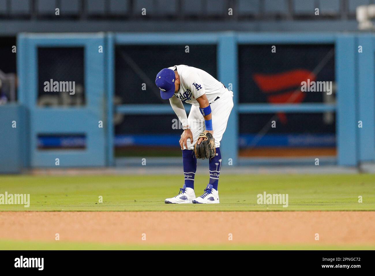 Los Angeles Dodgers shortstop Miguel Rojas (11) comes up slow after a ...