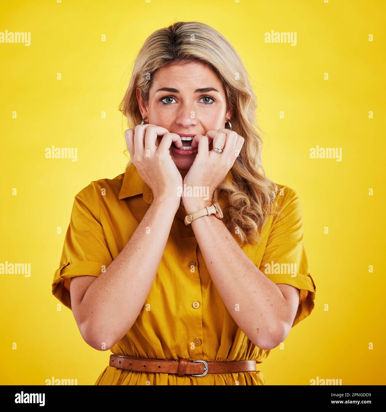 Portrait, biting nails and woman in studio with anxiety, nervous and ...