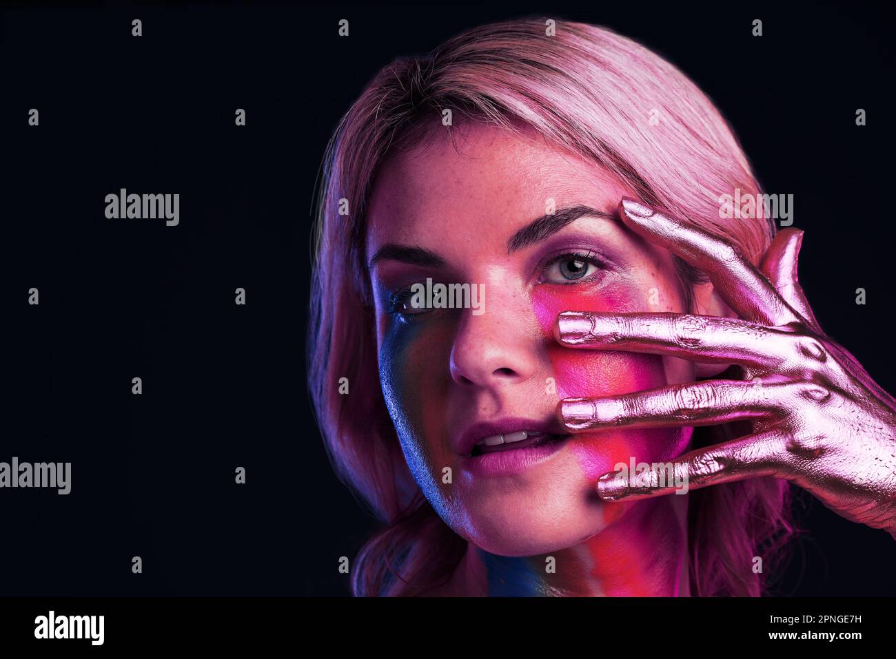 Woman, metallic hand and beauty portrait with color paint cosmetics on ...