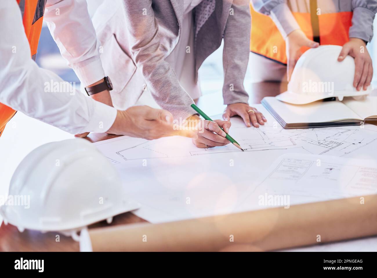 Architecture, planning and blueprint with hands of people for project ...