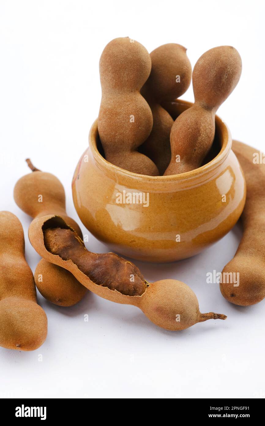 fresh Delicious ripe tamarinds, tamarind with brown pulp with green ...