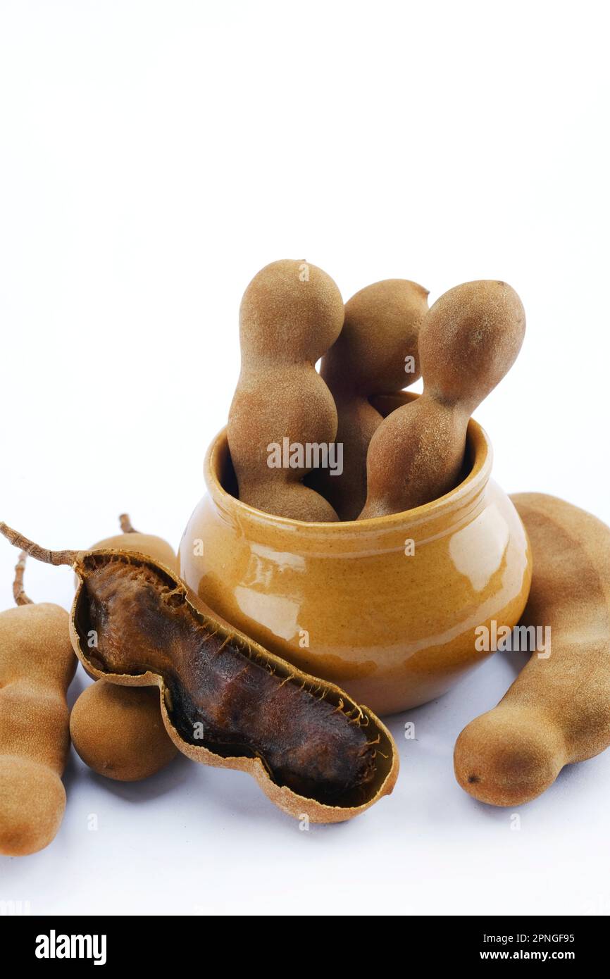 fresh Delicious ripe tamarinds, tamarind with brown pulp with green ...