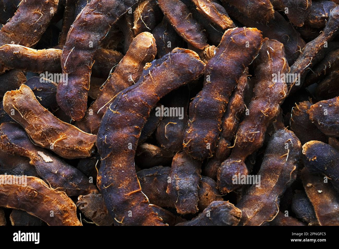 Organic tamarind peel, tamarind background, It is brown in color and ...